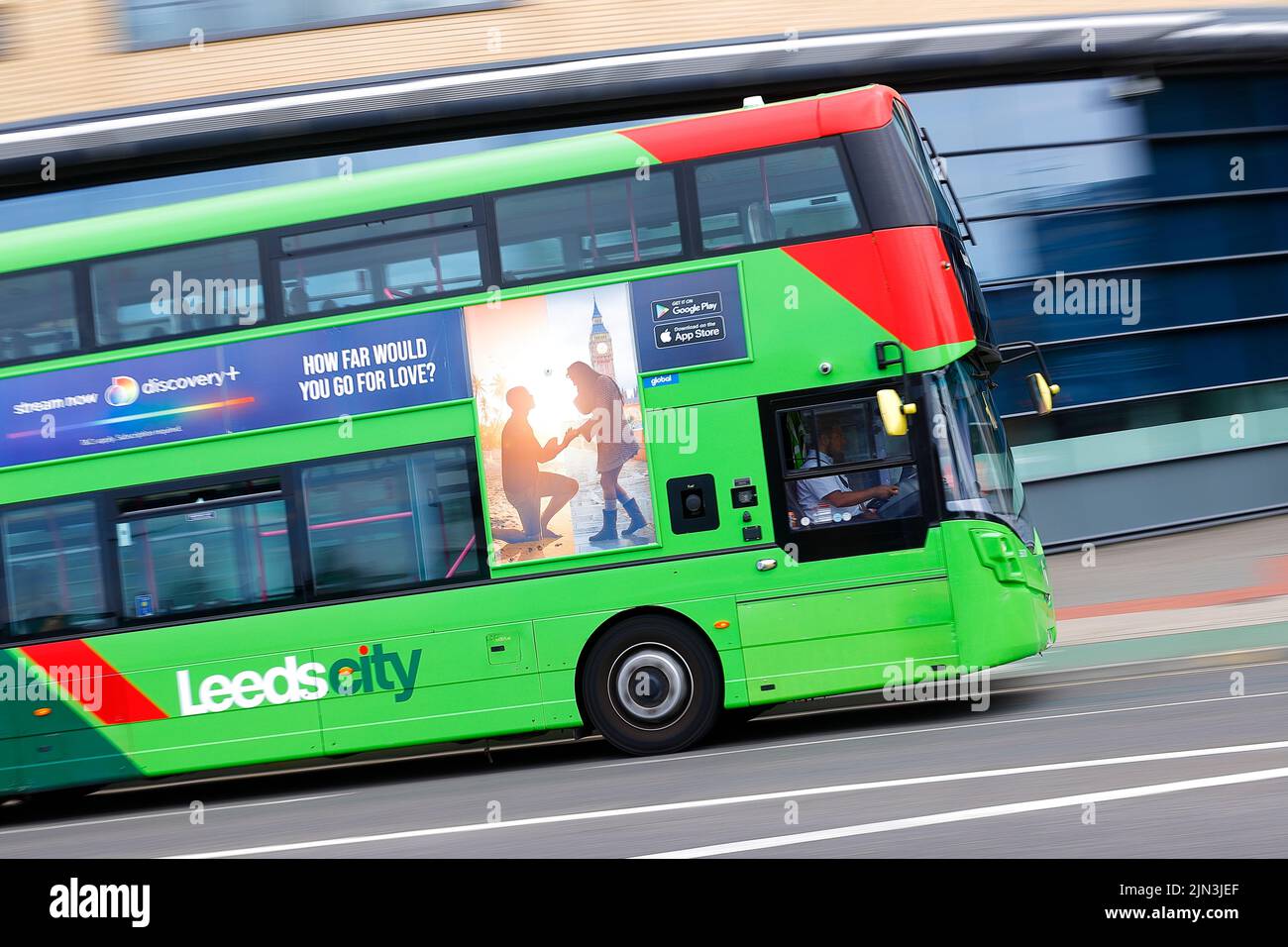 A double decker bus operated by First Bus Company seen passing throug ...