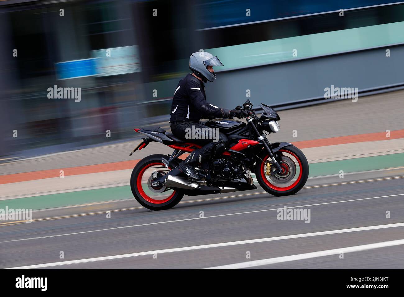 Speeding motorcycle hi-res stock photography and images - Alamy