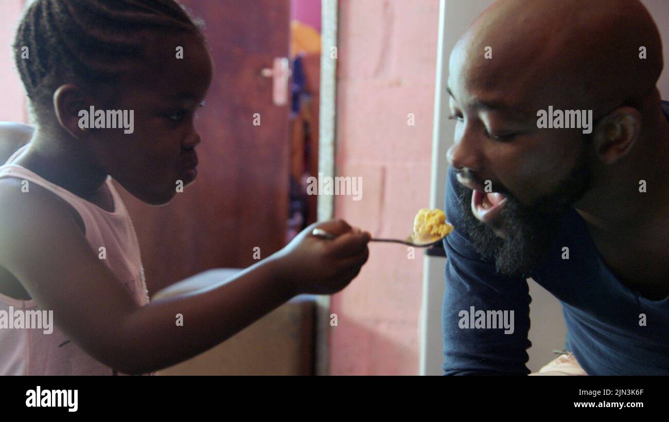 BLIND AMBITION, Pardon Taguzu (right), 2021. © Samuel Goldwyn Films ...