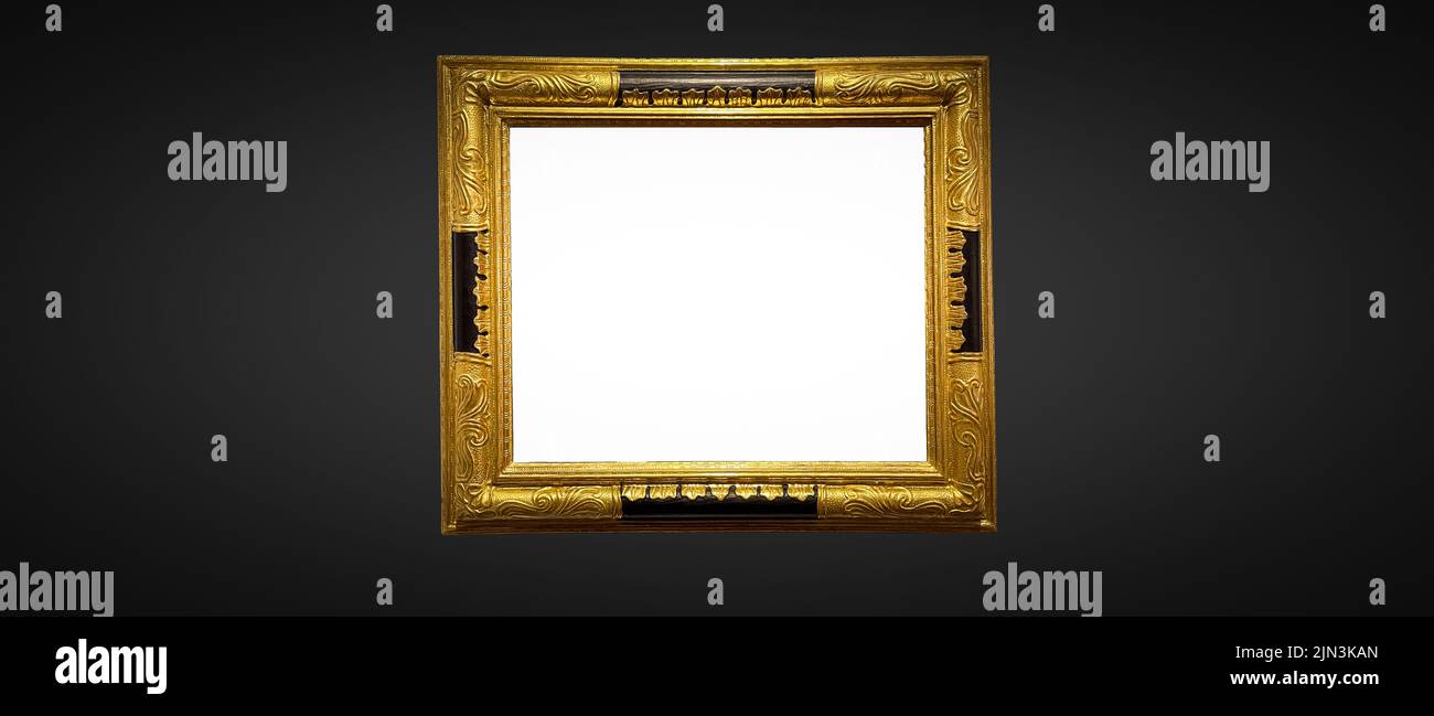 Antique art fair gallery frame on royal black wall at auction house or ...
