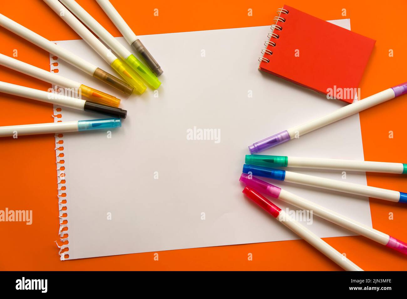 Creative kids, concept. Colorful crayon paints and blank notepad on ...