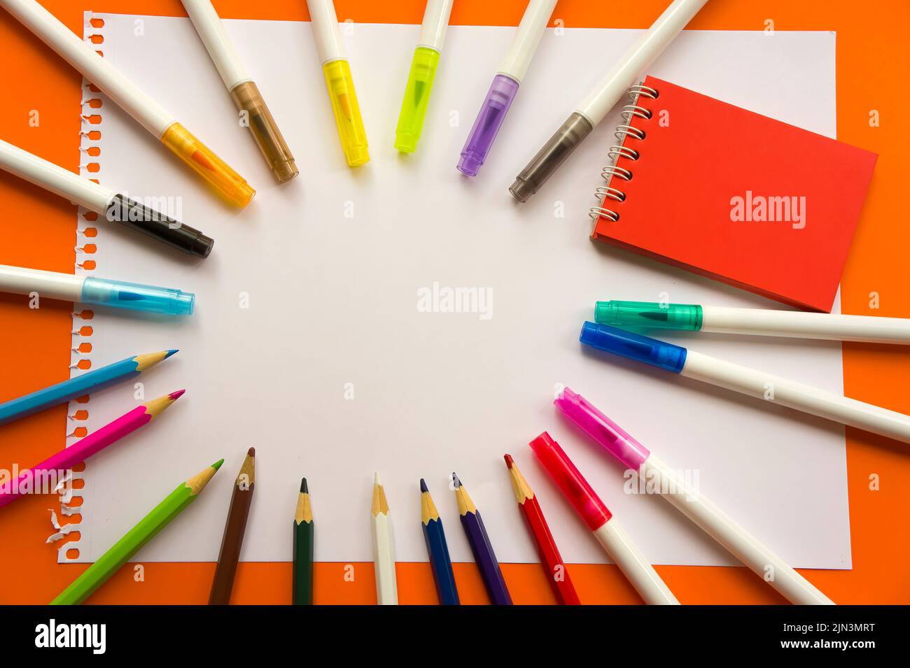 Creative kids, concept. Colorful crayon paints and blank notepad on ...