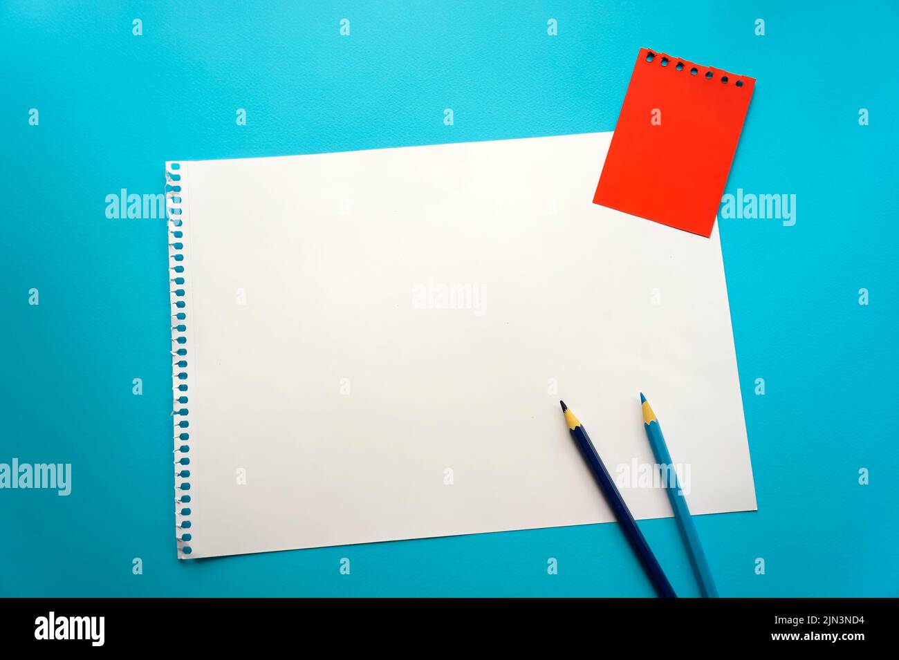 Blank sheet of paper space for design and lettering on a beautiful blue ...