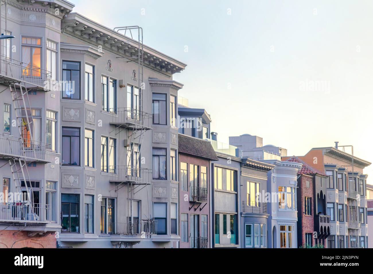 Victorian and Italianate houses in urban San Francisco, California. Row ...