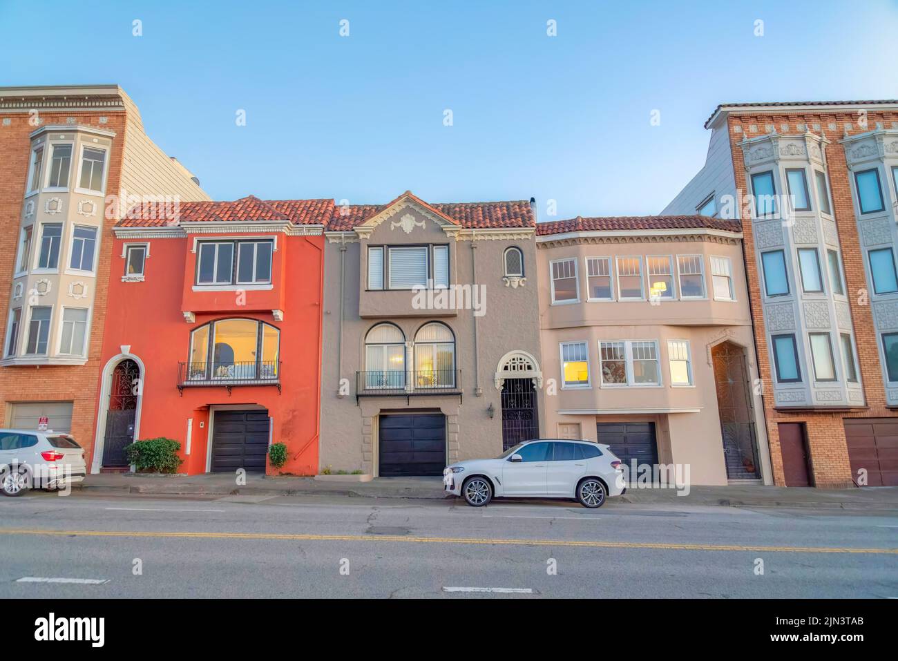 Rowhouses in San Francisco, California with metal gate doors and ...
