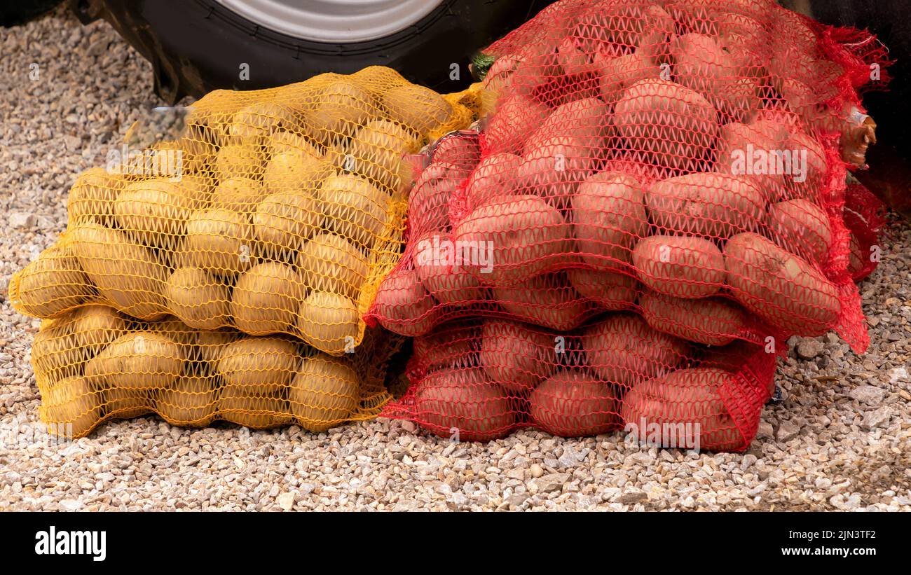 Raw potatoes in net hi-res stock photography and images - Alamy