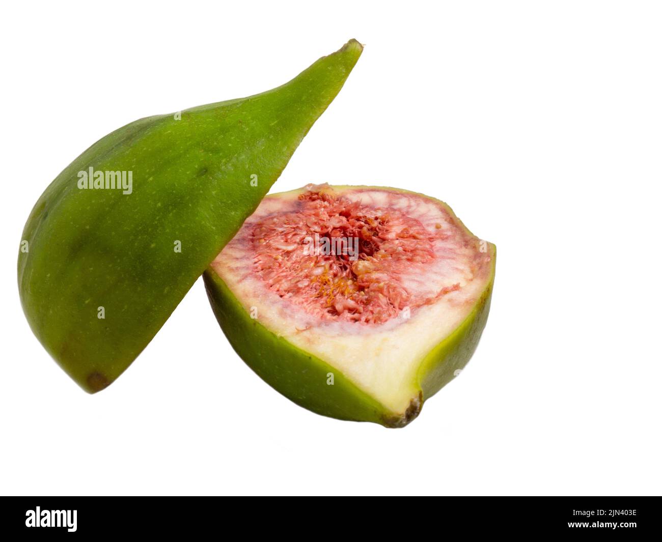 Fig cut in half. Fresh raw fruit. Fig. Figs with seeds. The pulp of a ...