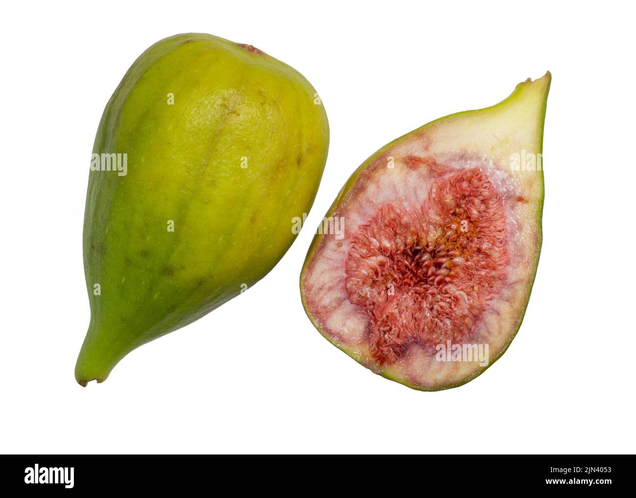 Fig cut in half. Fresh raw fruit. Fig. Figs with seeds. The pulp of a ...
