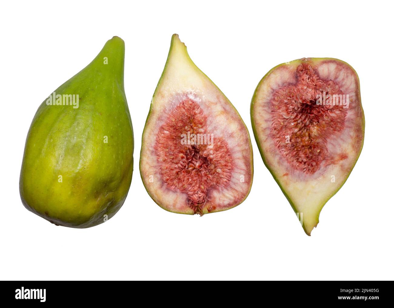 Fig cut in half. Fresh raw fruit. Fig. Figs with seeds. The pulp of a ...