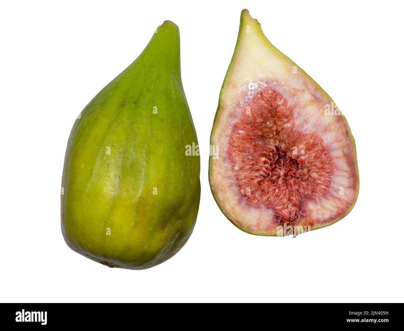 Fig cut in half. Fresh raw fruit. Fig. Figs with seeds. The pulp of a ...