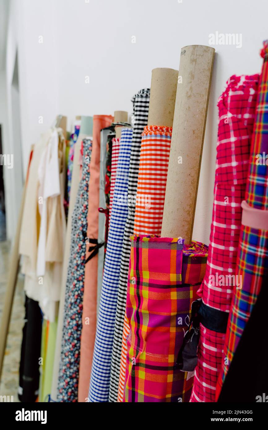 tubes of fabrics with which to design garments Stock Photo - Alamy