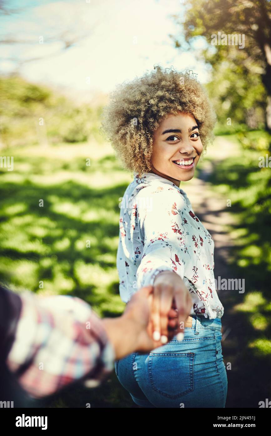 Wherever you go, go with all your heart. a young woman pulling her ...