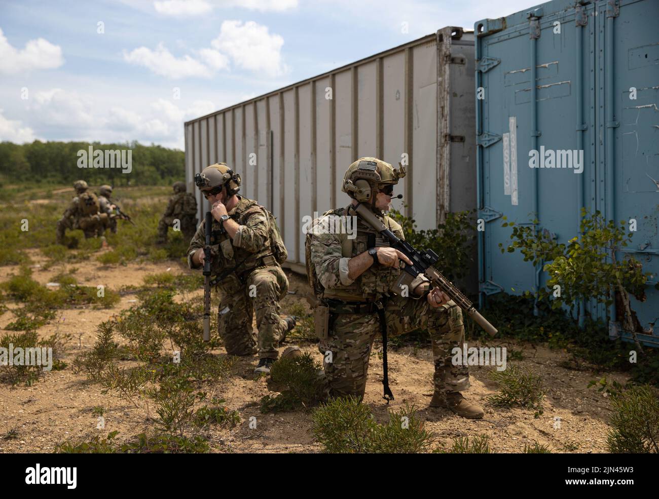 Operators from the 20th Special Forces Group conduct an aerial assault ...