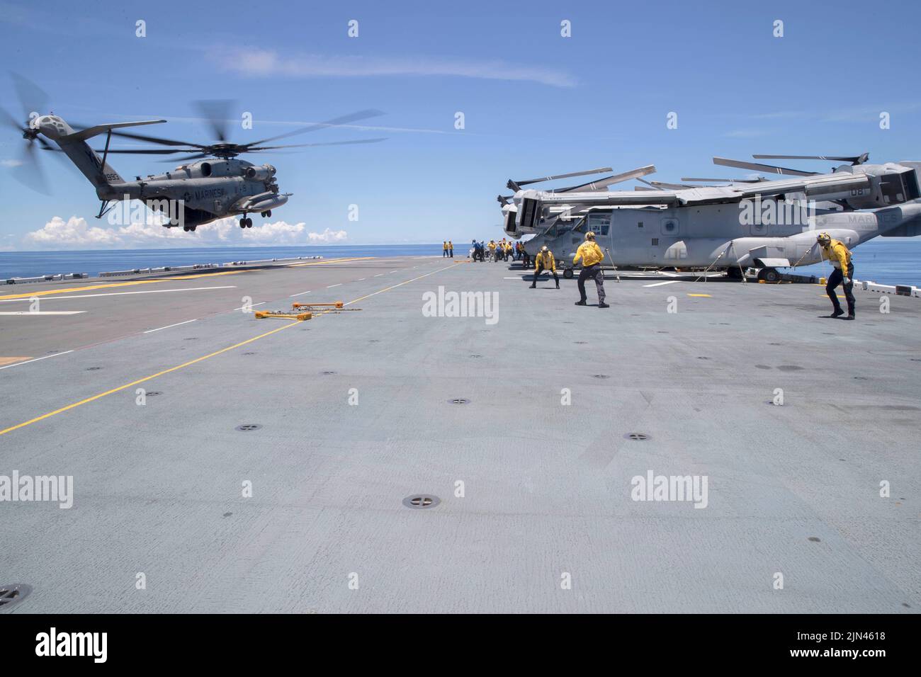 220805-N-XN177-1327 PHILIPPINE SEA (Aug. 5, 2022) – Sailors brace ...