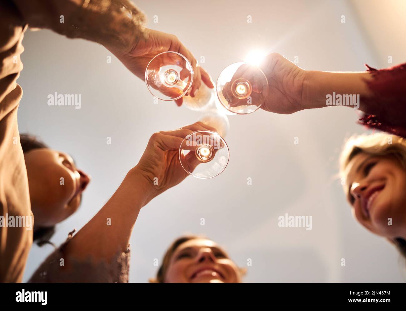Three people making a toast hi-res stock photography and images - Alamy