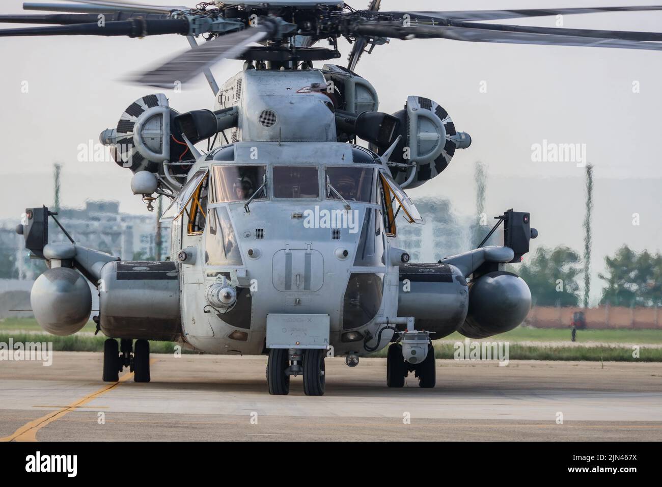 A U.S. Marine Corps CH-53E Super Stallion helicopter with Marine Heavy ...