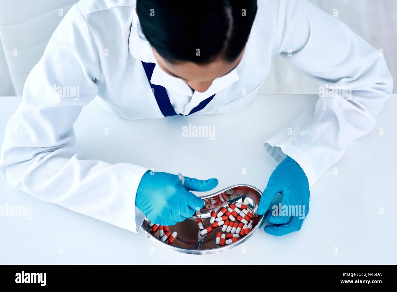 Accuracy is key in the pharmaceutical industry. High angle shot of an ...