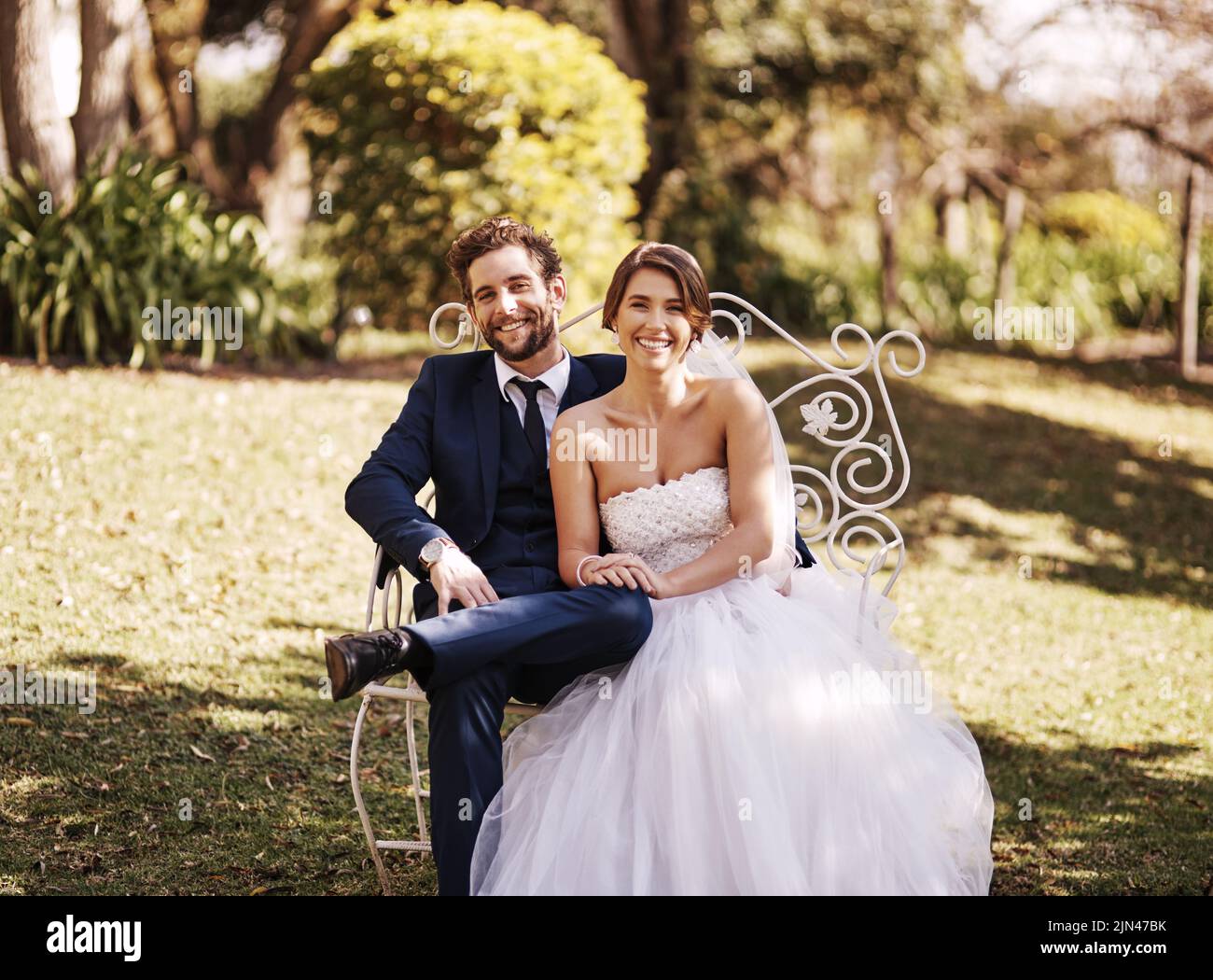 Were so happy we finally tied the knot. Cropped portrait of an ...