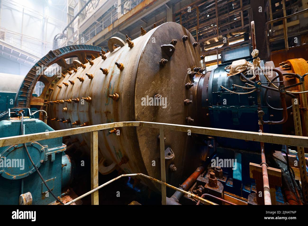 Ball mill grinds ore at mining and concentrating plant Stock Photo - Alamy