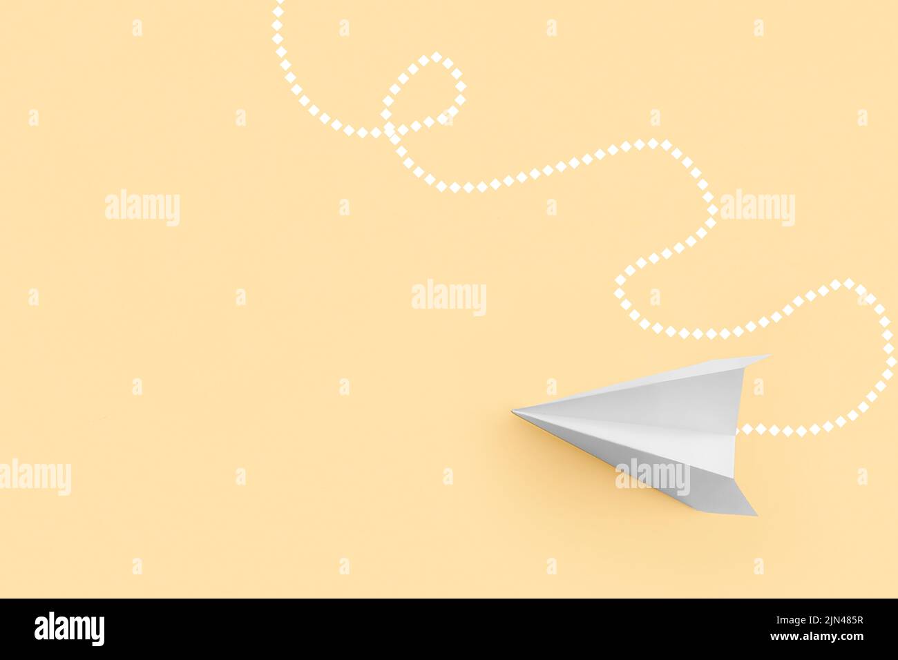 Paper plane on beige background, top view Stock Photo - Alamy