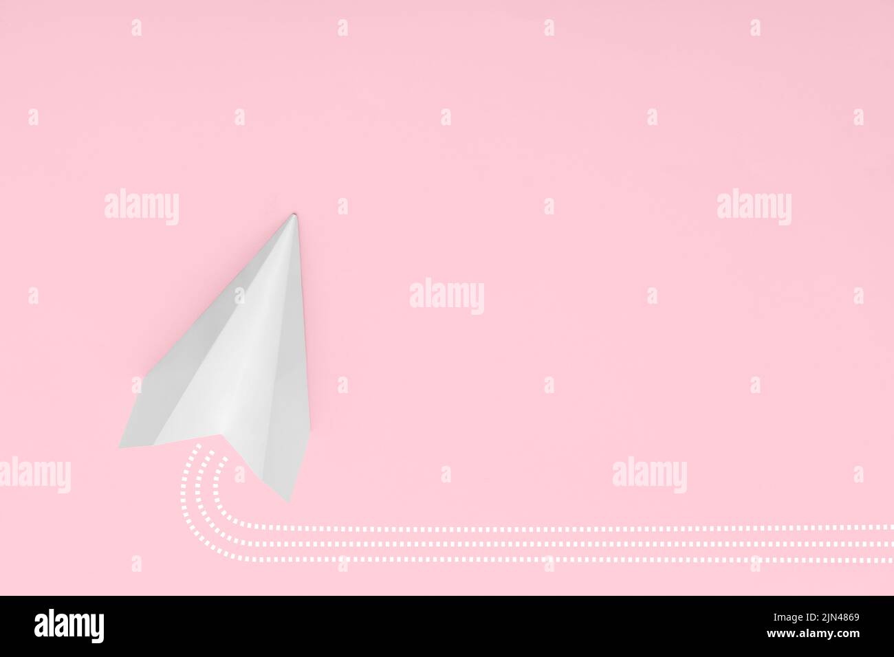Paper plane on pink background, top view Stock Photo - Alamy