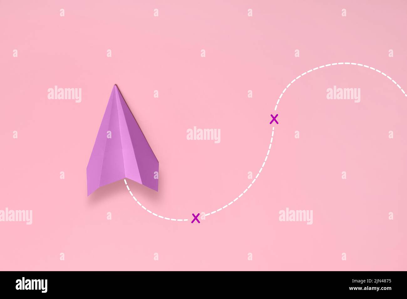Paper plane on pink background Stock Photo - Alamy