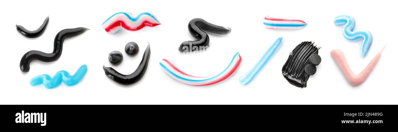 Samples of different tooth paste on white background Stock Photo - Alamy