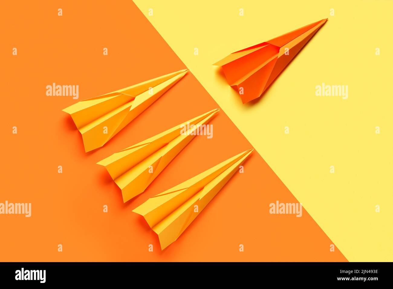 Paper planes on color background Stock Photo - Alamy