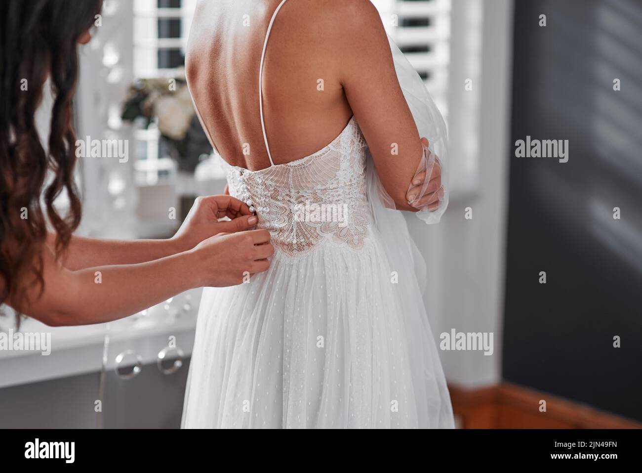 Because what are bridesmaids for. an unrecognizable bridesmaid helping ...