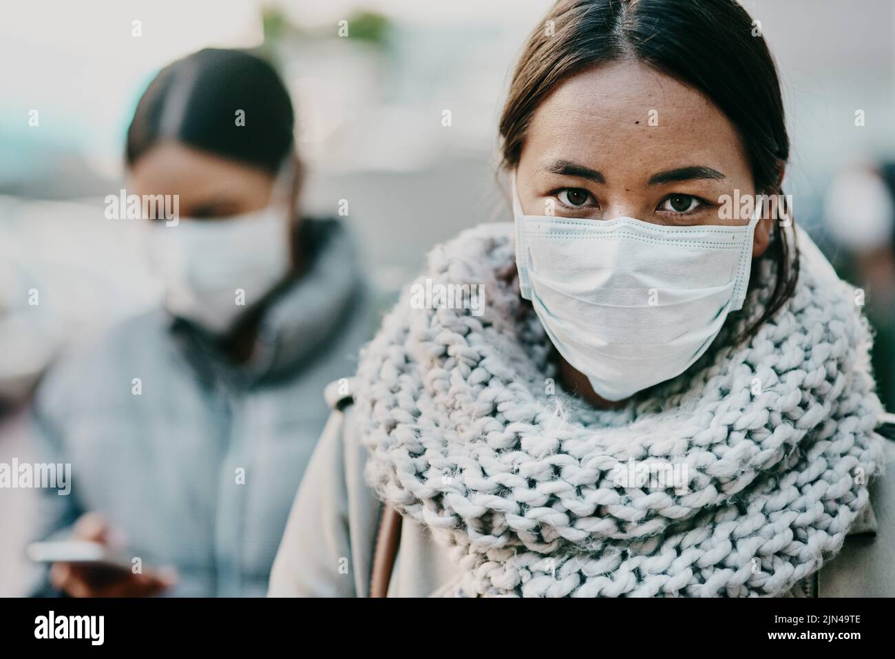 Sick young covid patient, wearing medical face mask to stop the spread ...