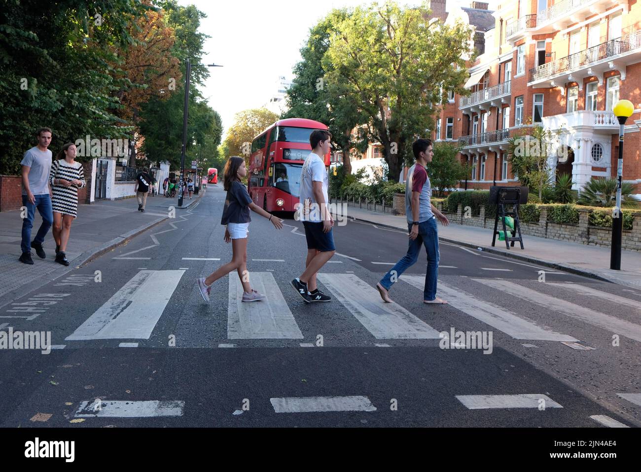 London, UK, 8th Aug, 2022. Beatles fans pose for photos on the crossing ...