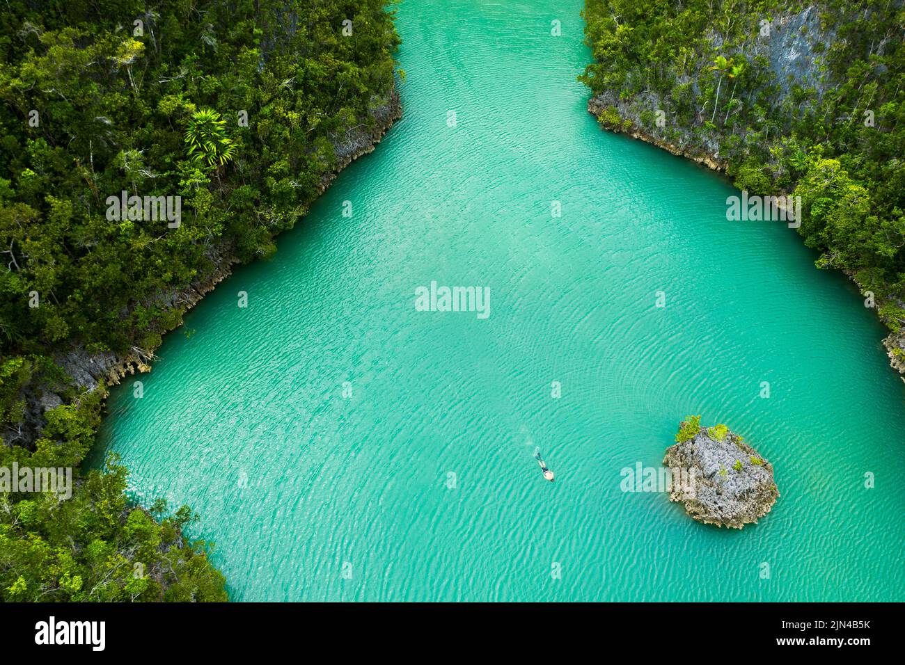 Staying afloat is what I do best. High angle shot of a man swimming in ...