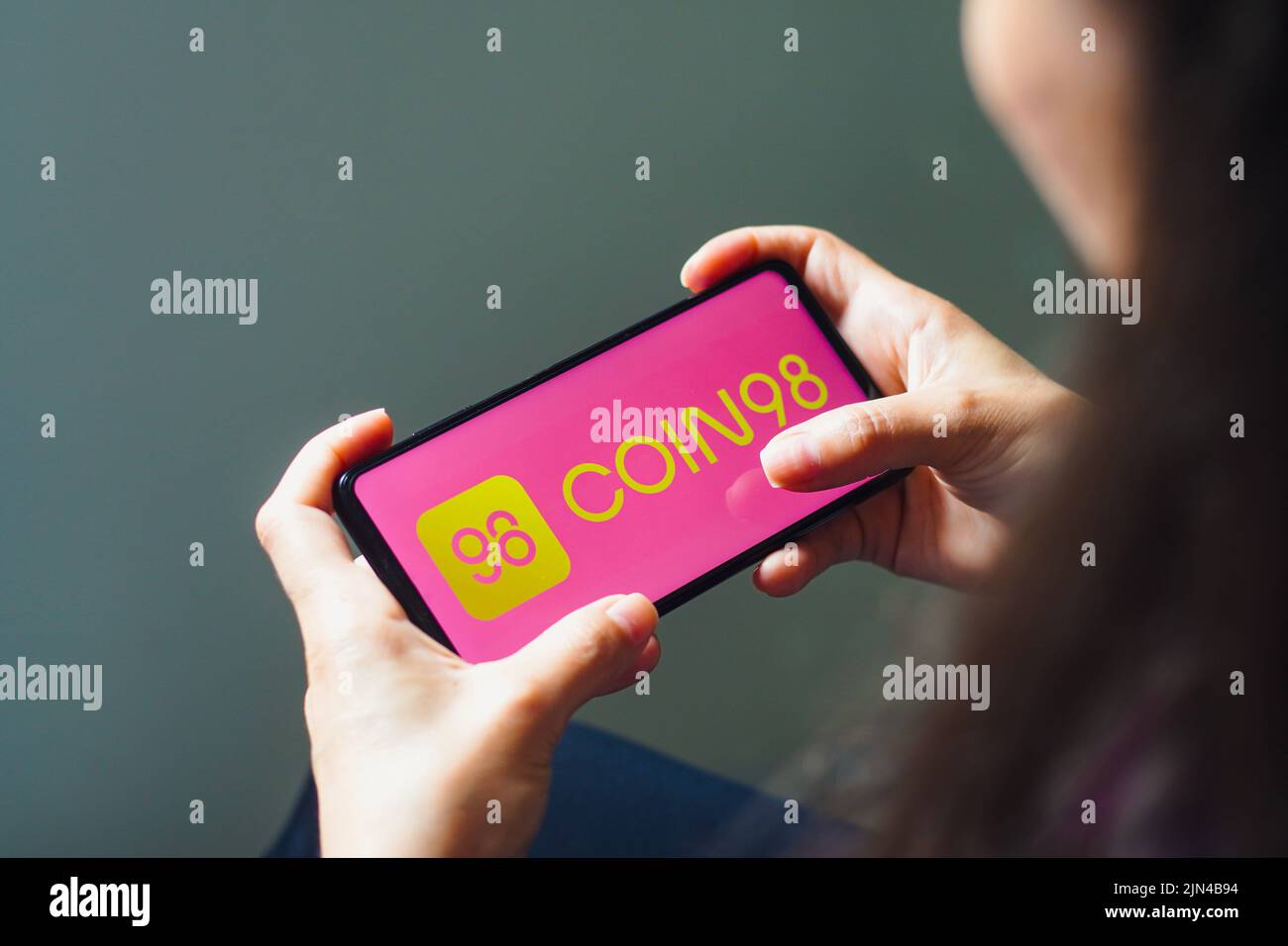 Coin98 on smartphone hi-res stock photography and images - Alamy