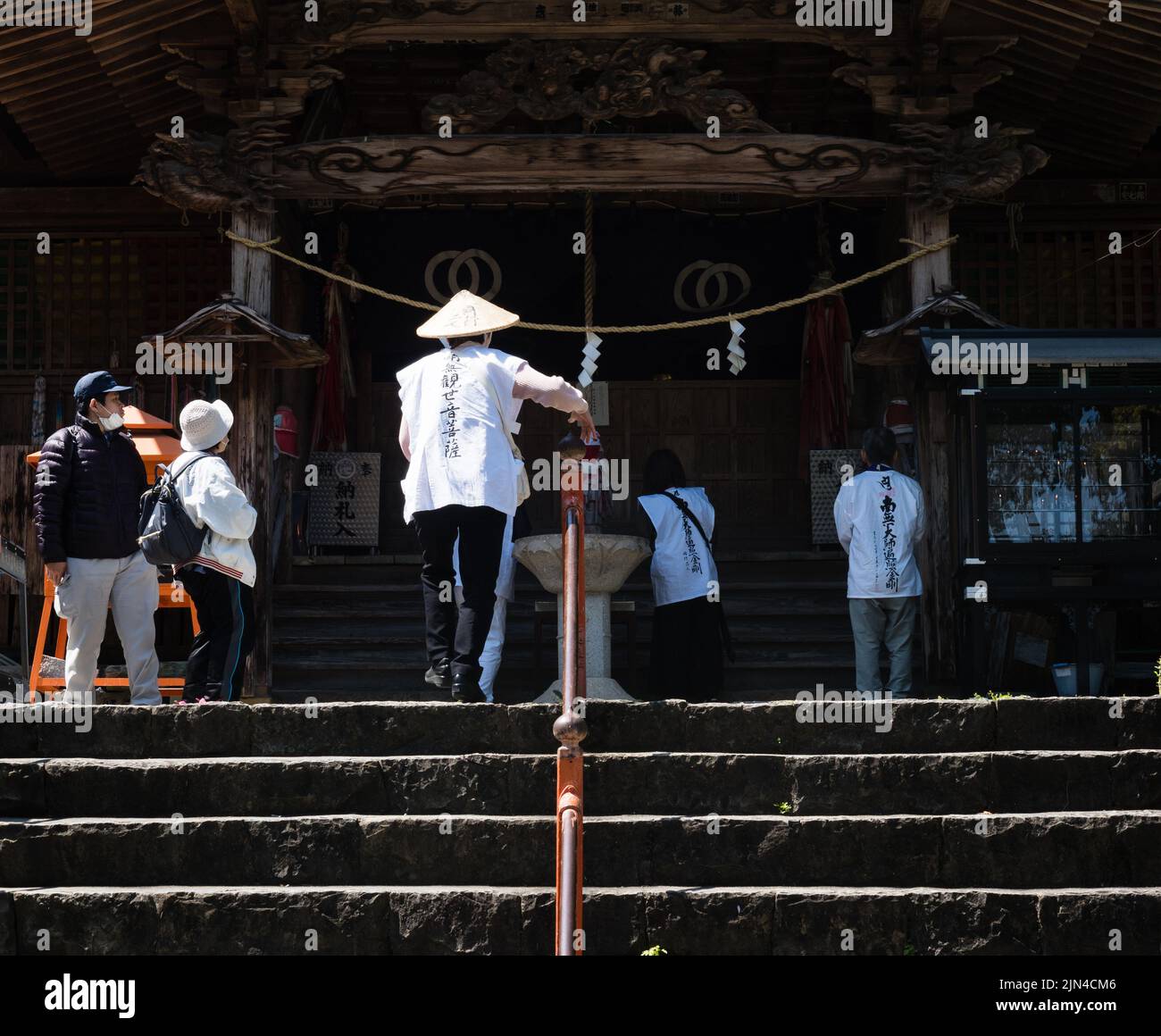 Kochi, Japan - April 7, 2018: O-henro pilgrim climbing the stairs ...