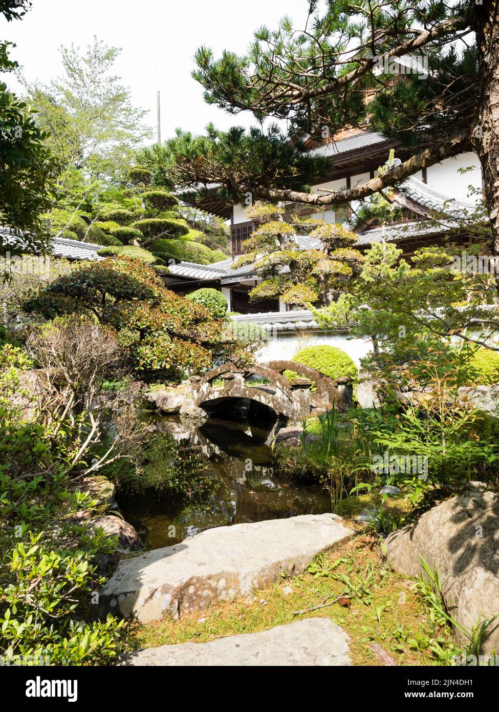 Sukumo, Japan - April 8, 2018: Traditional Japanese garden with pond on ...