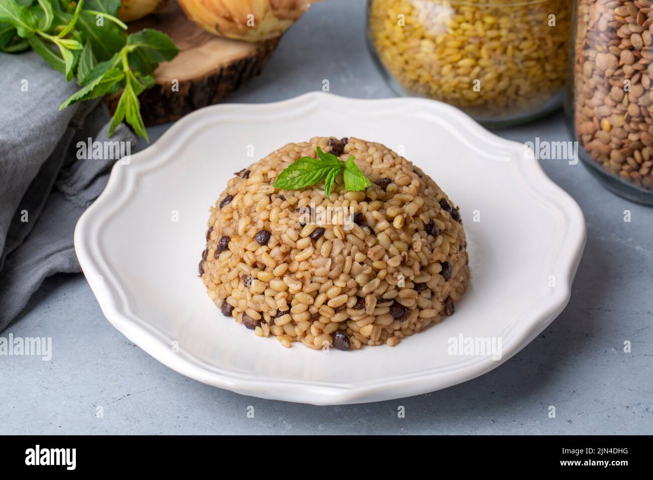 Traditional delicious Turkish foods; bulgur pilaf with green lentils ...
