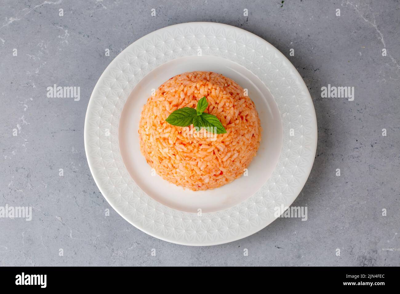 Traditional delicious Turkish food; rice pilaf with tomatoes (Turkish ...