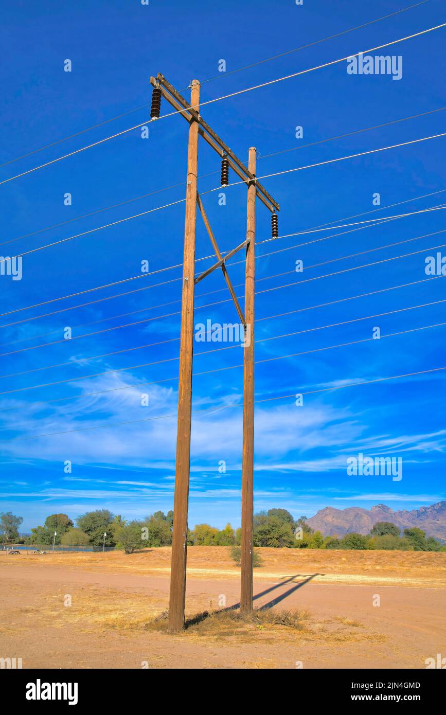 Electric transmission wood tower on a dry land at Tucson, Arizona ...