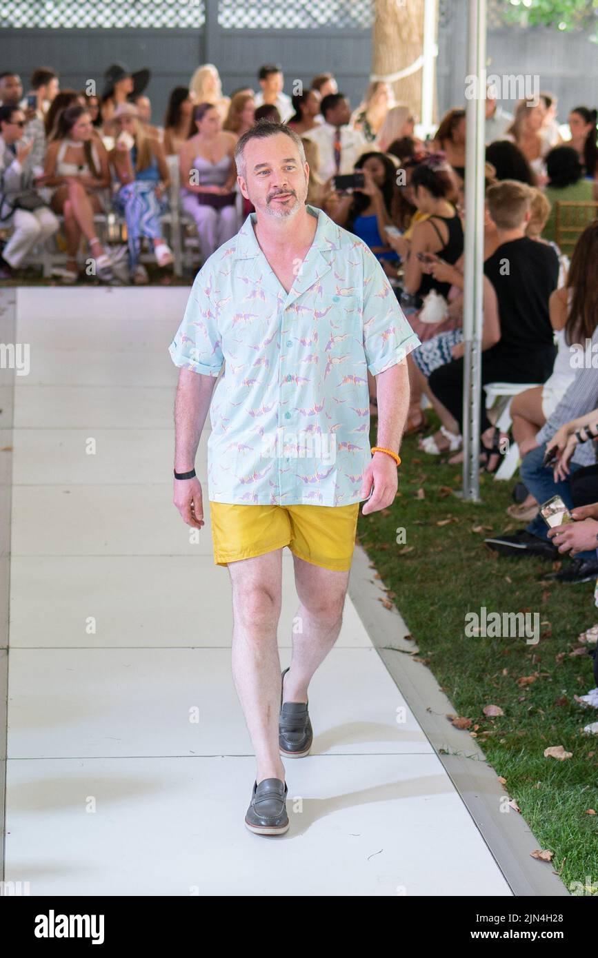 Models walk at the Hamptons Fashion Week at Southampton Art Center in ...