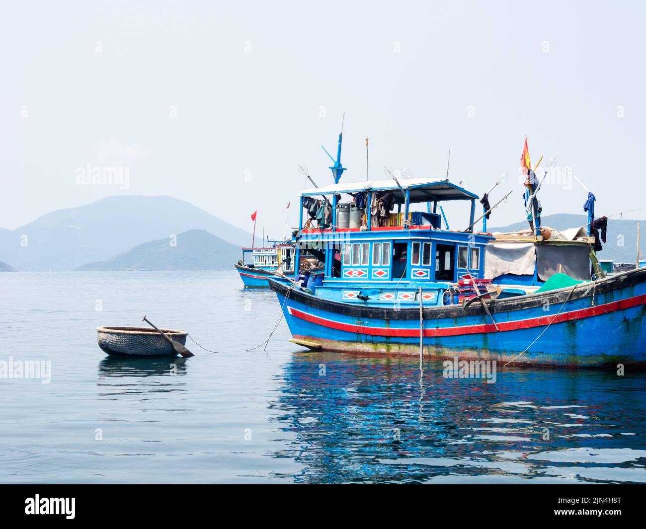 Fishing boats off the coast at Ben Tau Dam Mon pier, entry point for ...