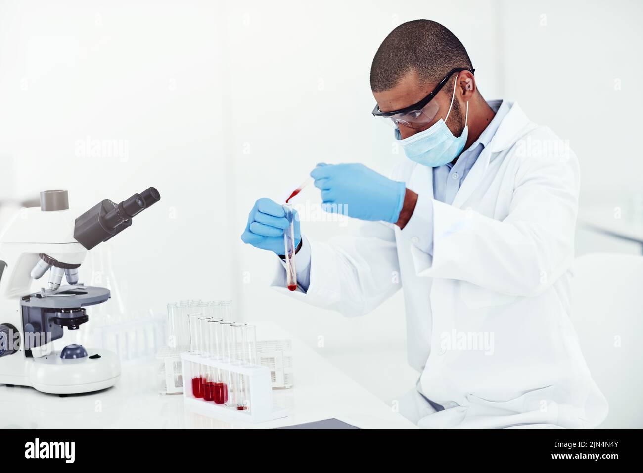 Innovation, science and medical discovery in a lab with a male ...