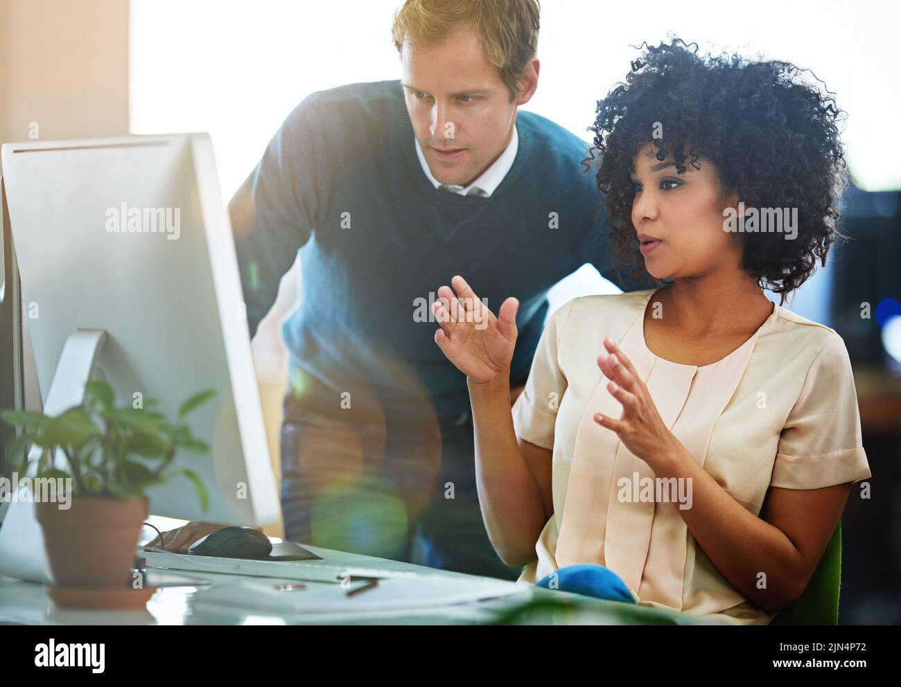 Manager, leader or boss helping creative staff on computer to plan idea ...