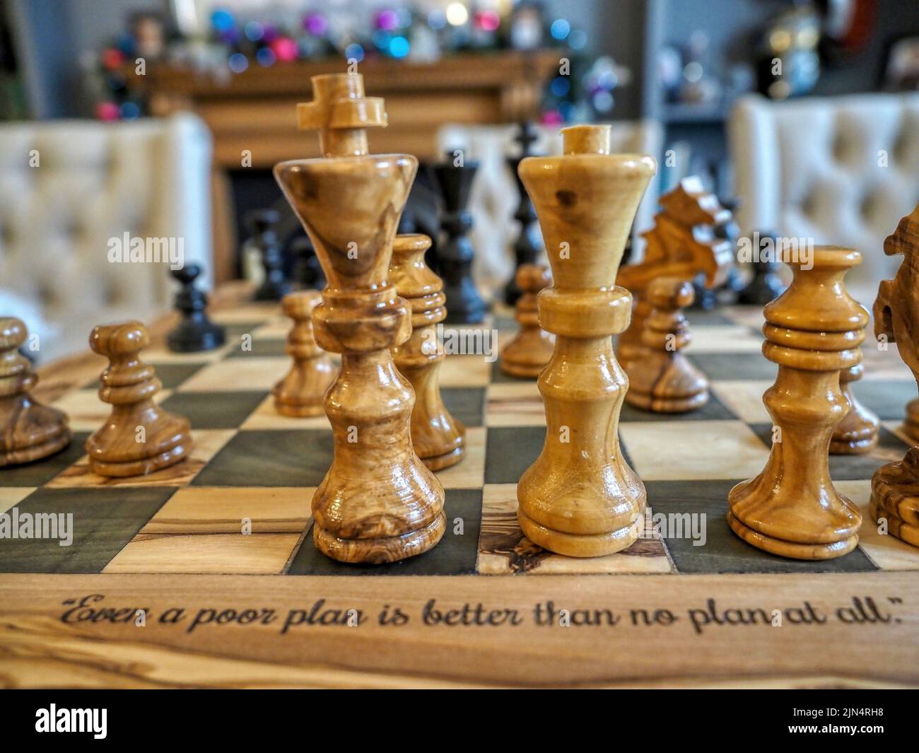 A motivational quote on the chessboard with the pieces on Stock Photo ...