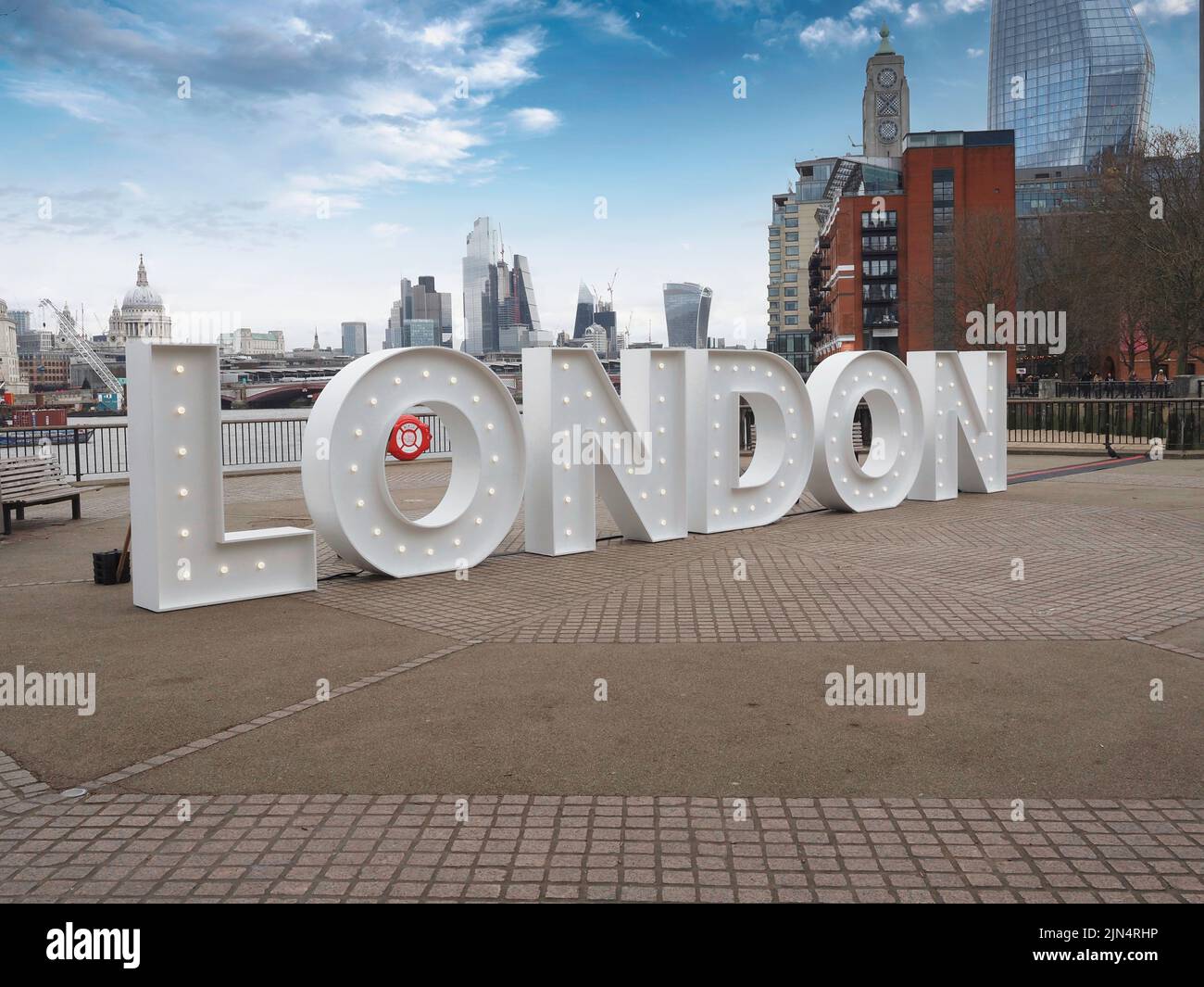 The white giant LONDON letters with lights in the street in South Bank ...