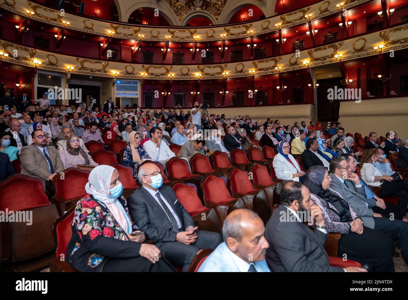 An audience enjoying party during medical event in Alexandria opera ...