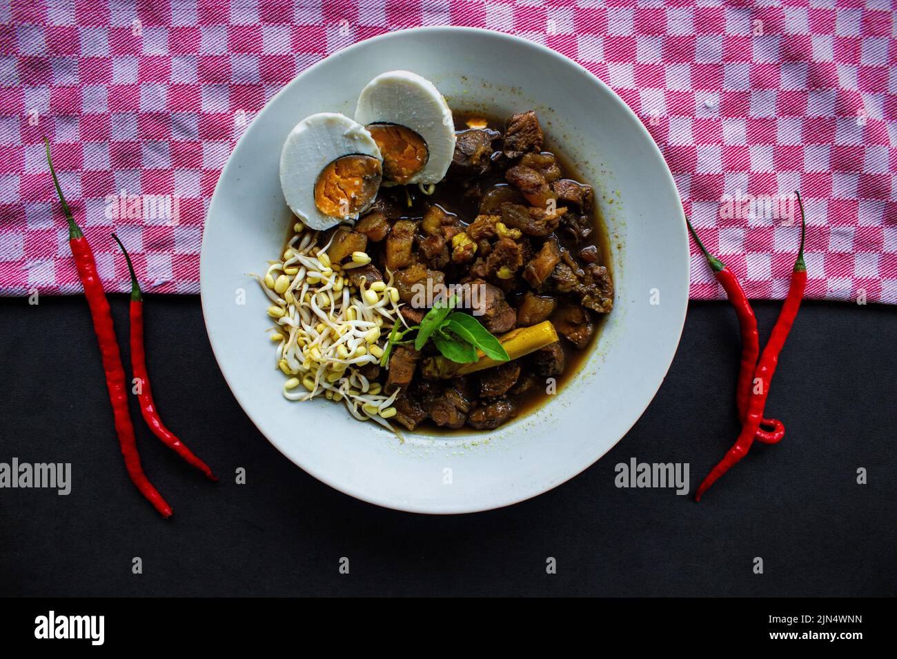 Rawon or Nasi Rawon/Rawon Rice is traditional Indonesian beef black ...