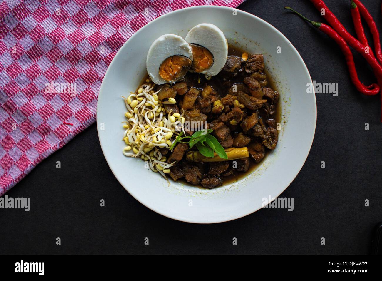 Rawon or Nasi Rawon/Rawon Rice is traditional Indonesian beef black ...