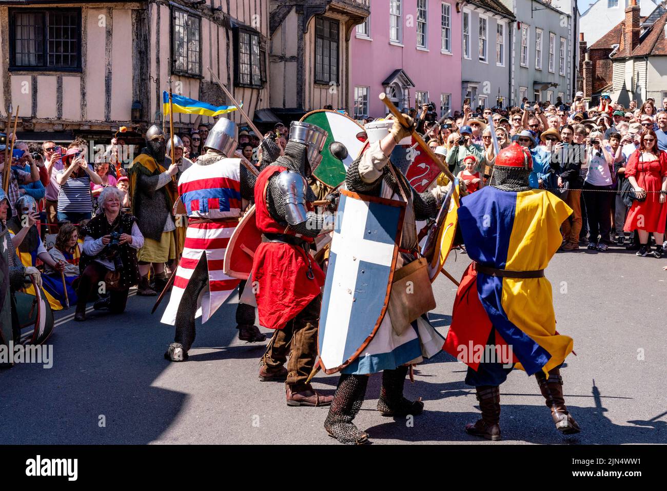 People Dressed In Medieval Costume Take Part In A Re-Enactment Of The ...