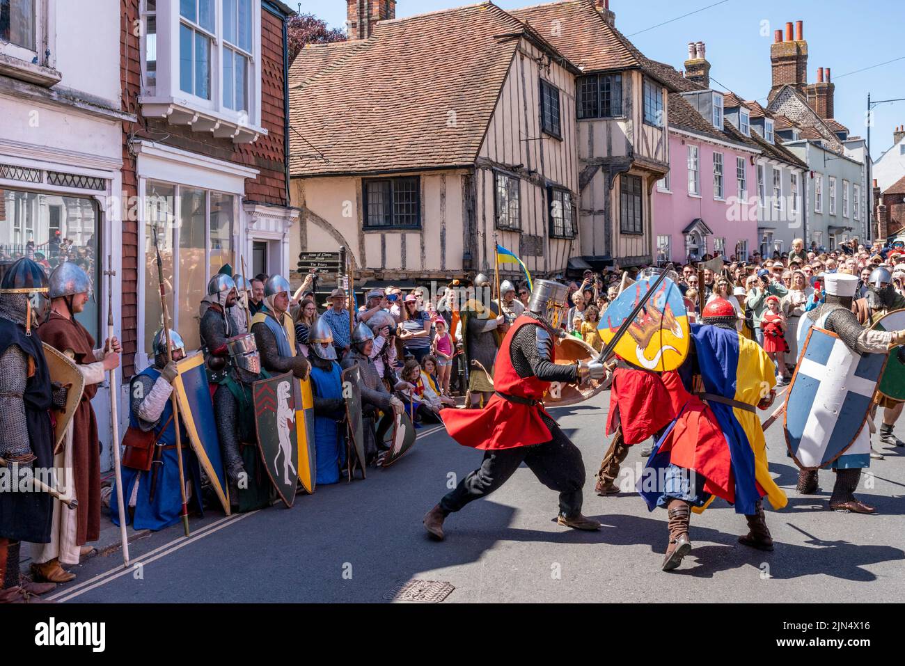 People Dressed In Medieval Costume Take Part In A Re-Enactment Of The ...