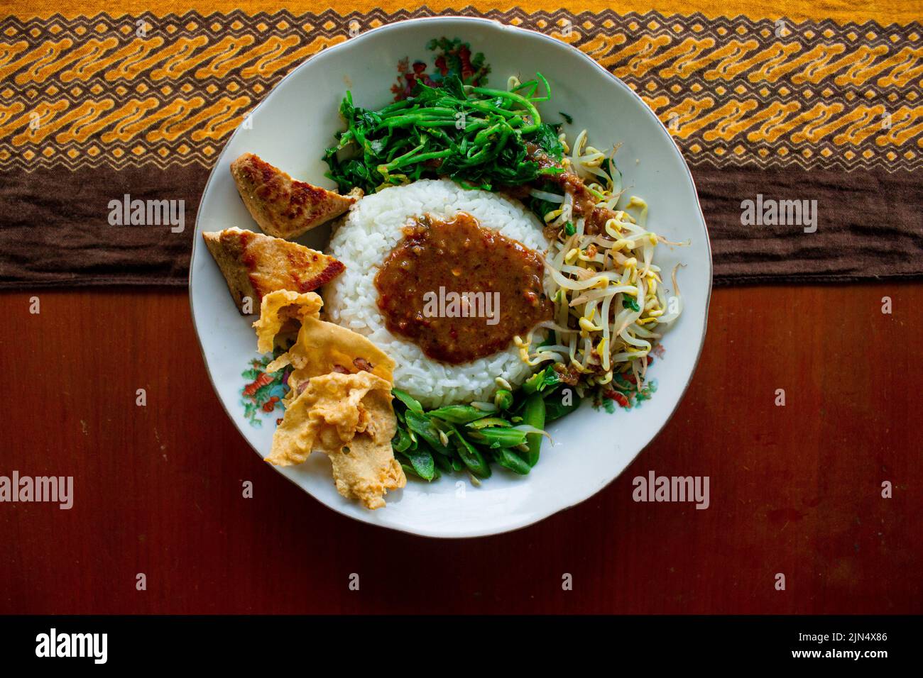 Nasi Pecel or sego pecel is Traditional Javanese rice dish of steamed ...